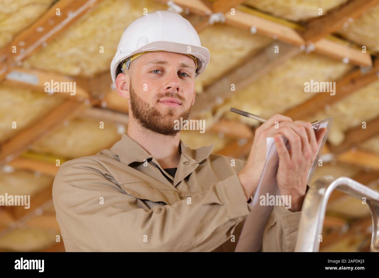 Male construction worker notepad hi-res stock photography and images ...