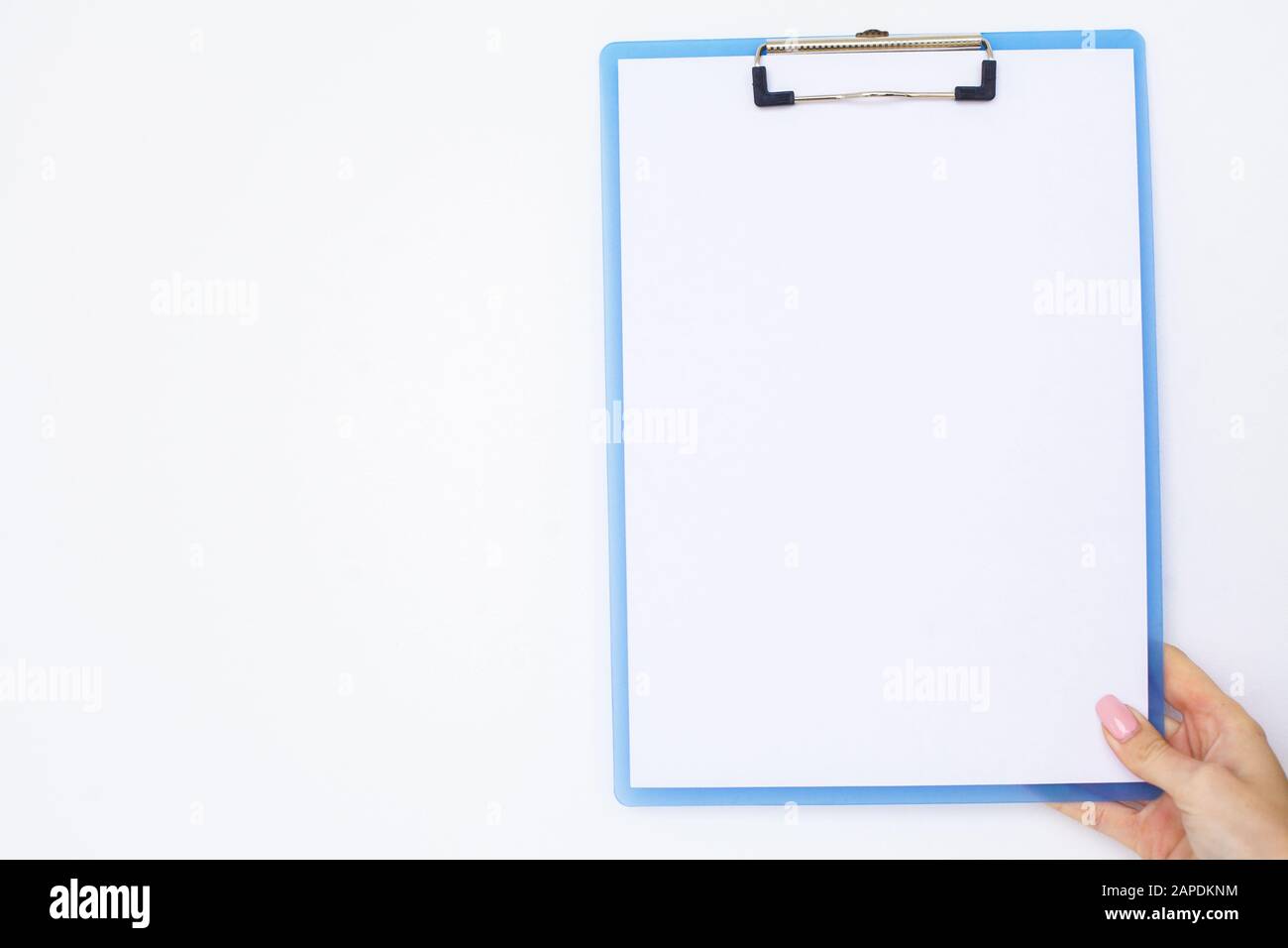 Blank Folder with White Paper. Hand that Holding Folder and Handle on ...
