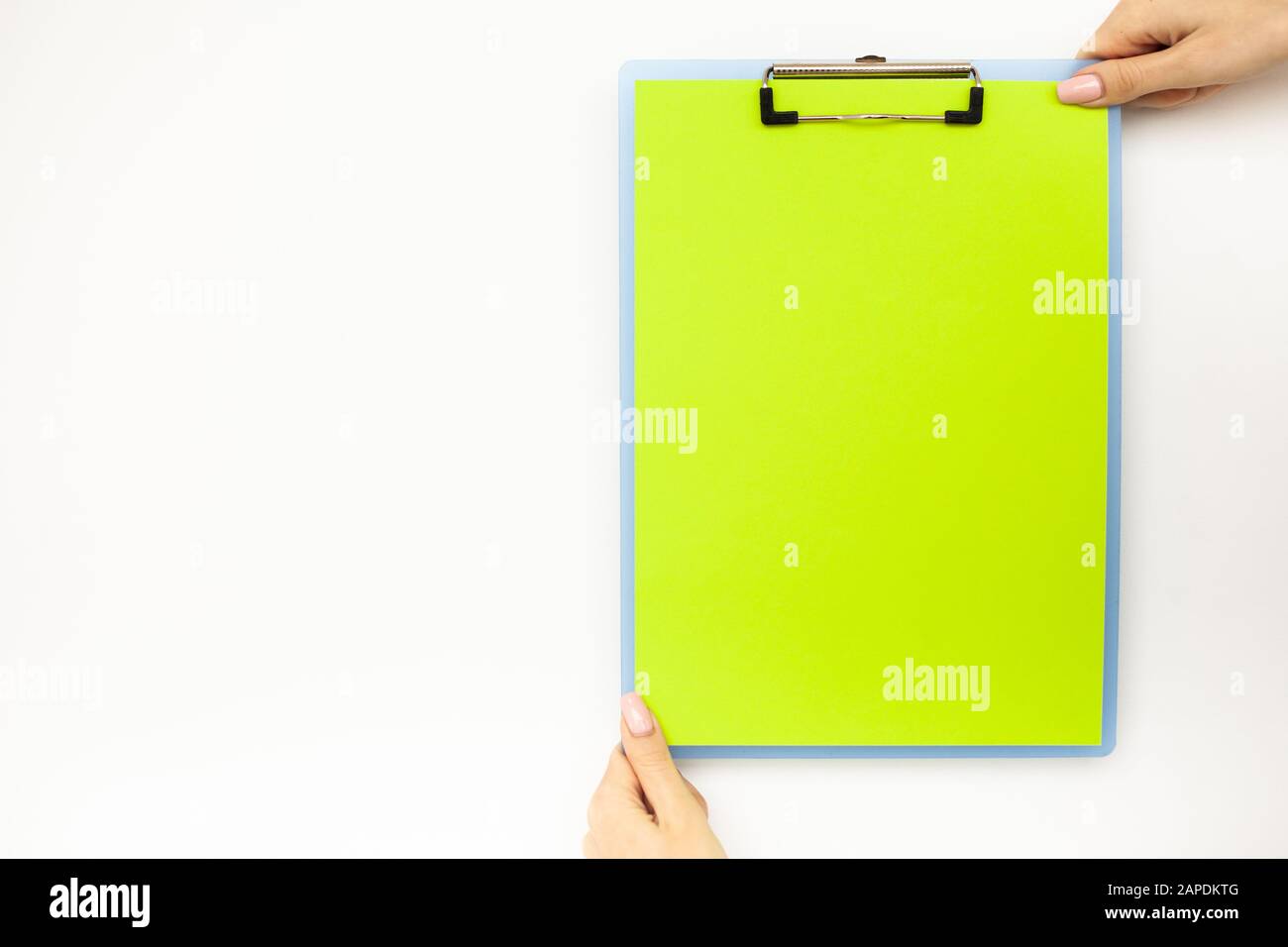 Blank Folder with Green Paper. Hand that Holding Folder and Handle on ...
