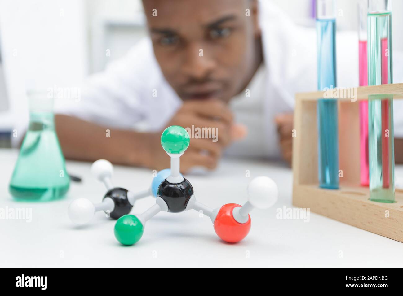 scientist examining dna model in laboratory Stock Photo - Alamy