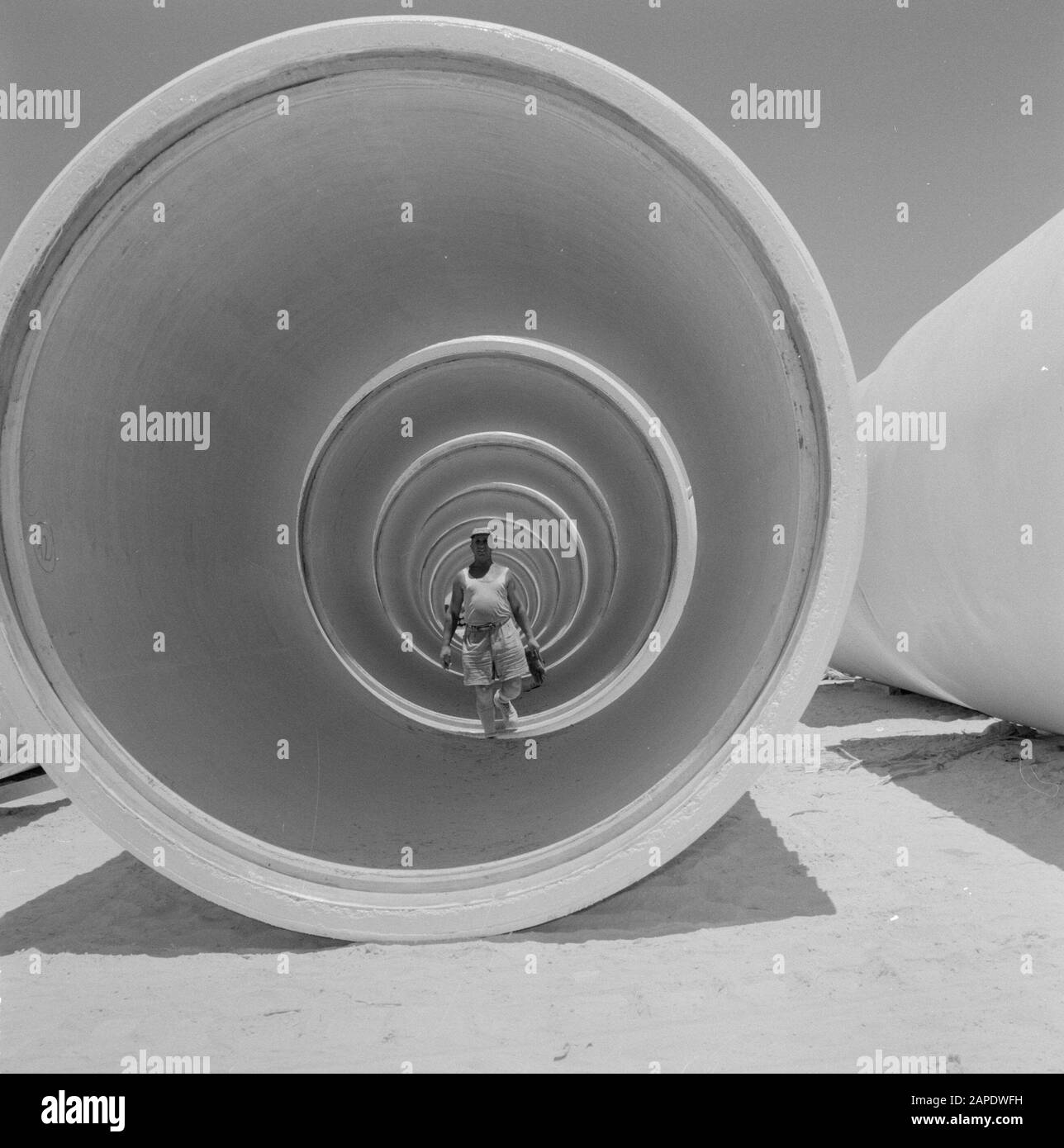 Construction worker walking Black and White Stock Photos & Images - Alamy