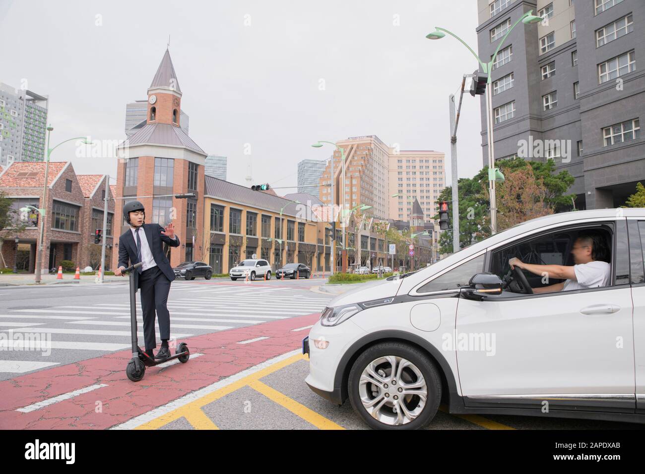 Smart mobility life concept, young man using an electric car, electric ...