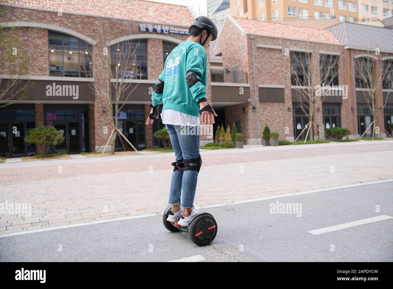 Smart mobility life concept, young man using an electric car, electric ...