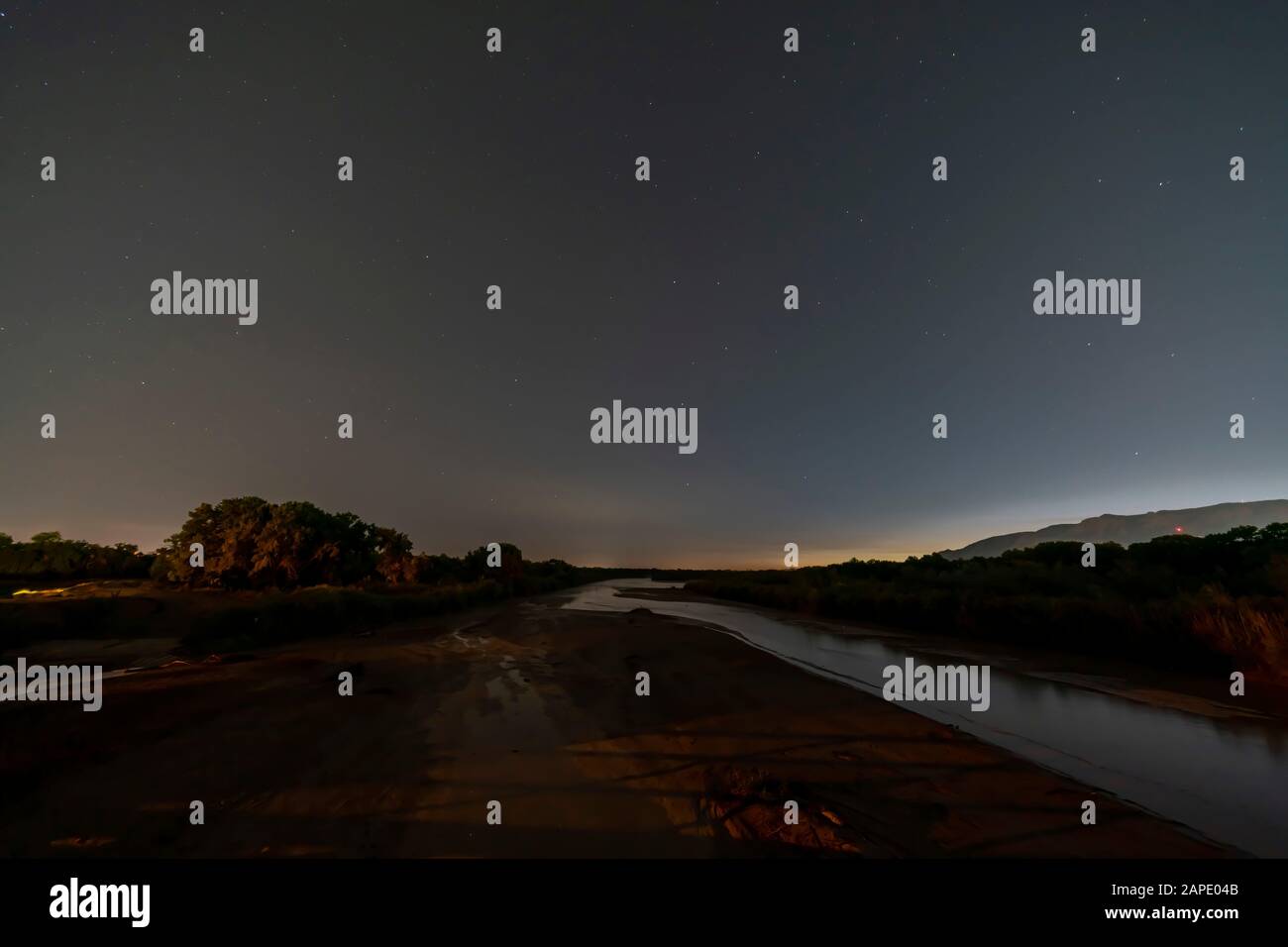 Night view of the Rio Grande river with a starry sky at Albuquerque ...
