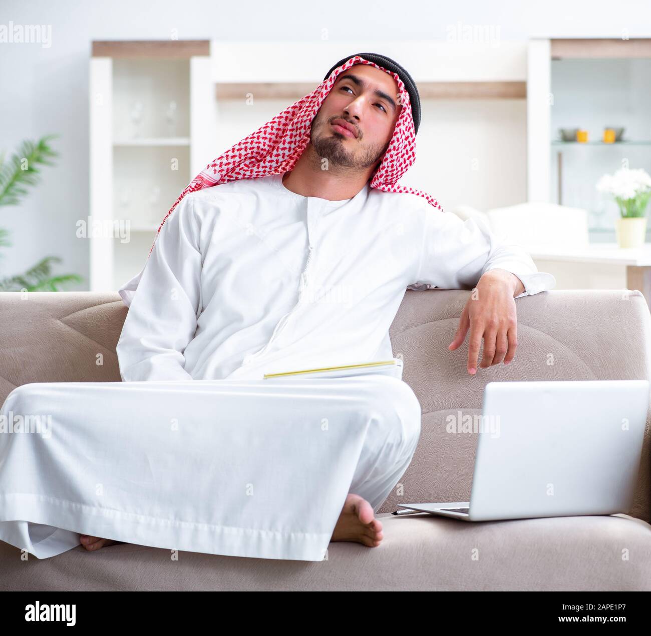 The arab man working at home on his work Stock Photo - Alamy