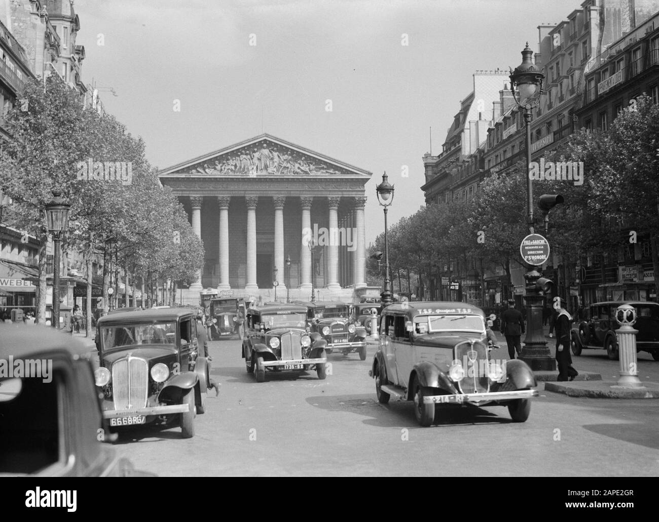 Reportage Paris Description: Cars on Rue Royale, with in the background ...