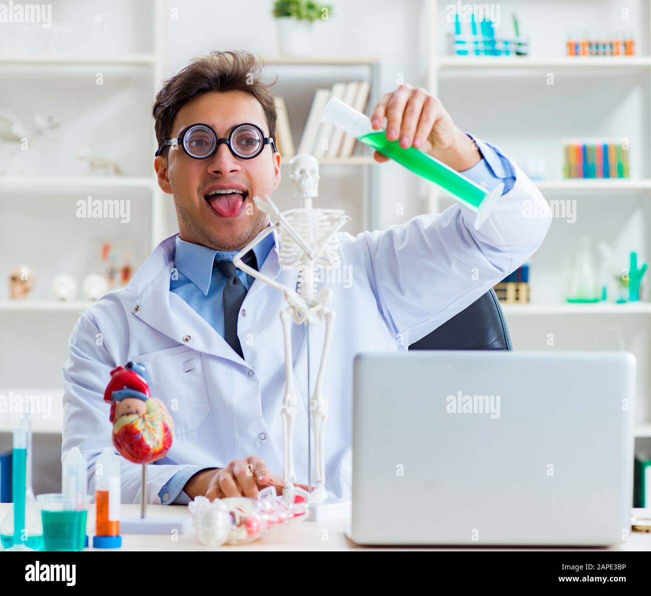 The funny doctor having fun in hospital lab Stock Photo - Alamy