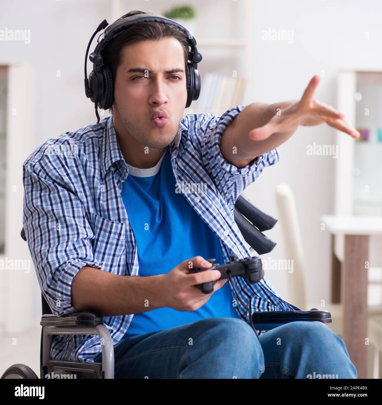 The disabled man playing computer games during rehabilitation Stock ...