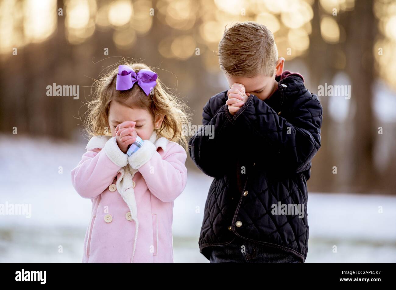 Black boy smiling praying hi-res stock photography and images - Alamy