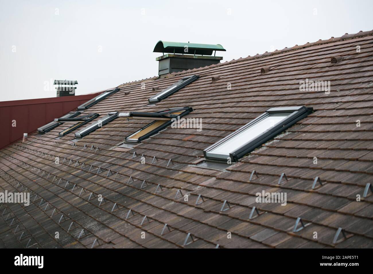 Rooftop with small windows at the time of construction during daytime ...