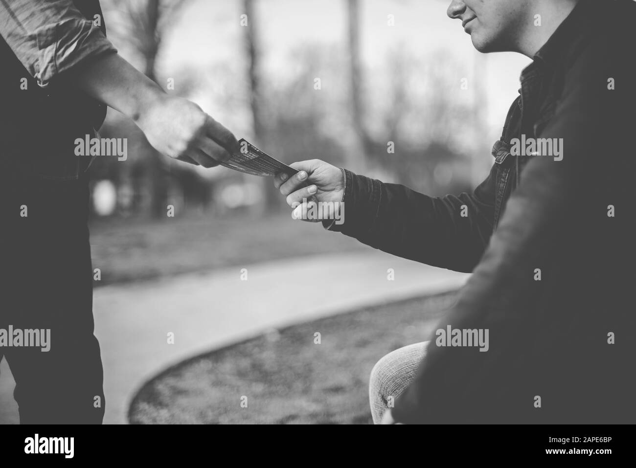 Giving leaflet Black and White Stock Photos & Images - Alamy