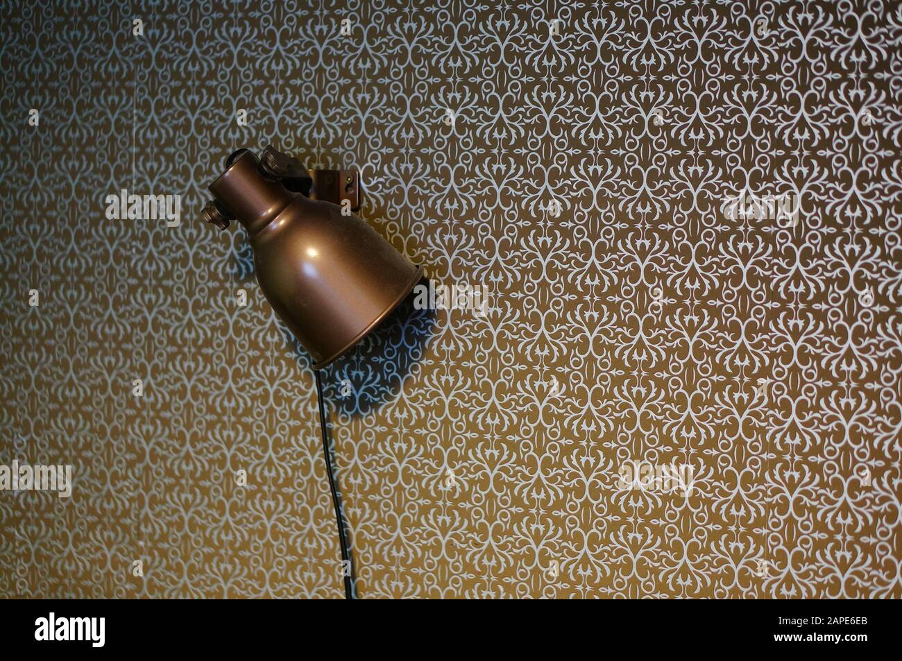 Old vintage lamp attached to a wall Stock Photo - Alamy
