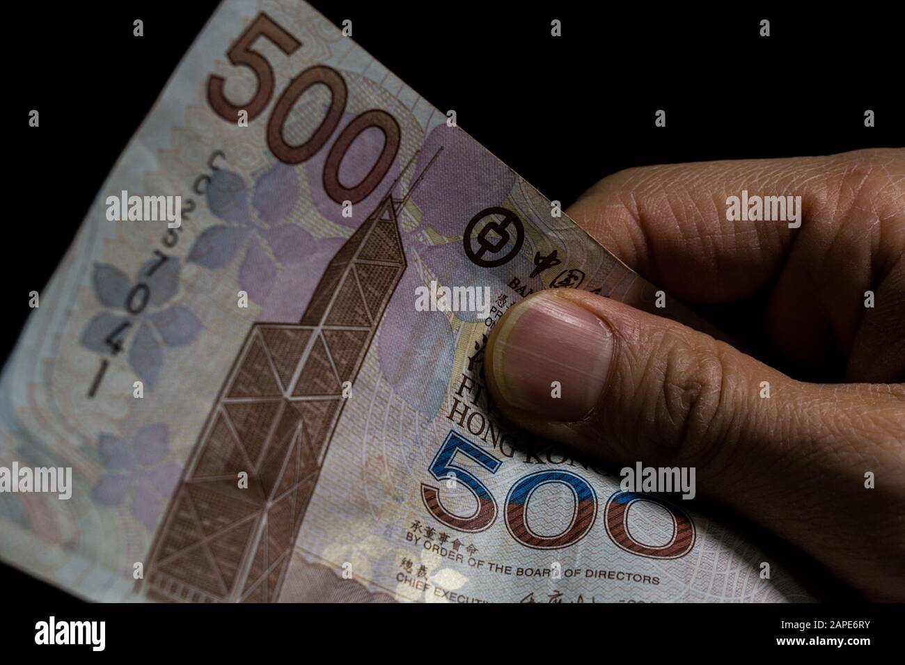 Closeup shot of 500 Hong Kong dollars (HKD) banknotes in front of a ...