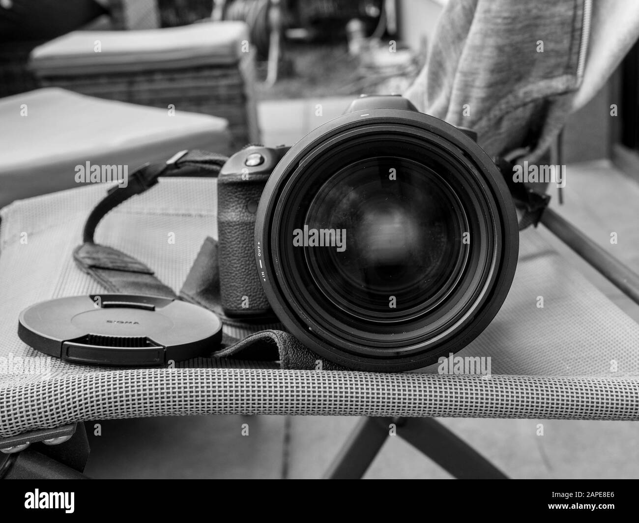 Close up front view shot of a camera in black and white Stock Photo - Alamy