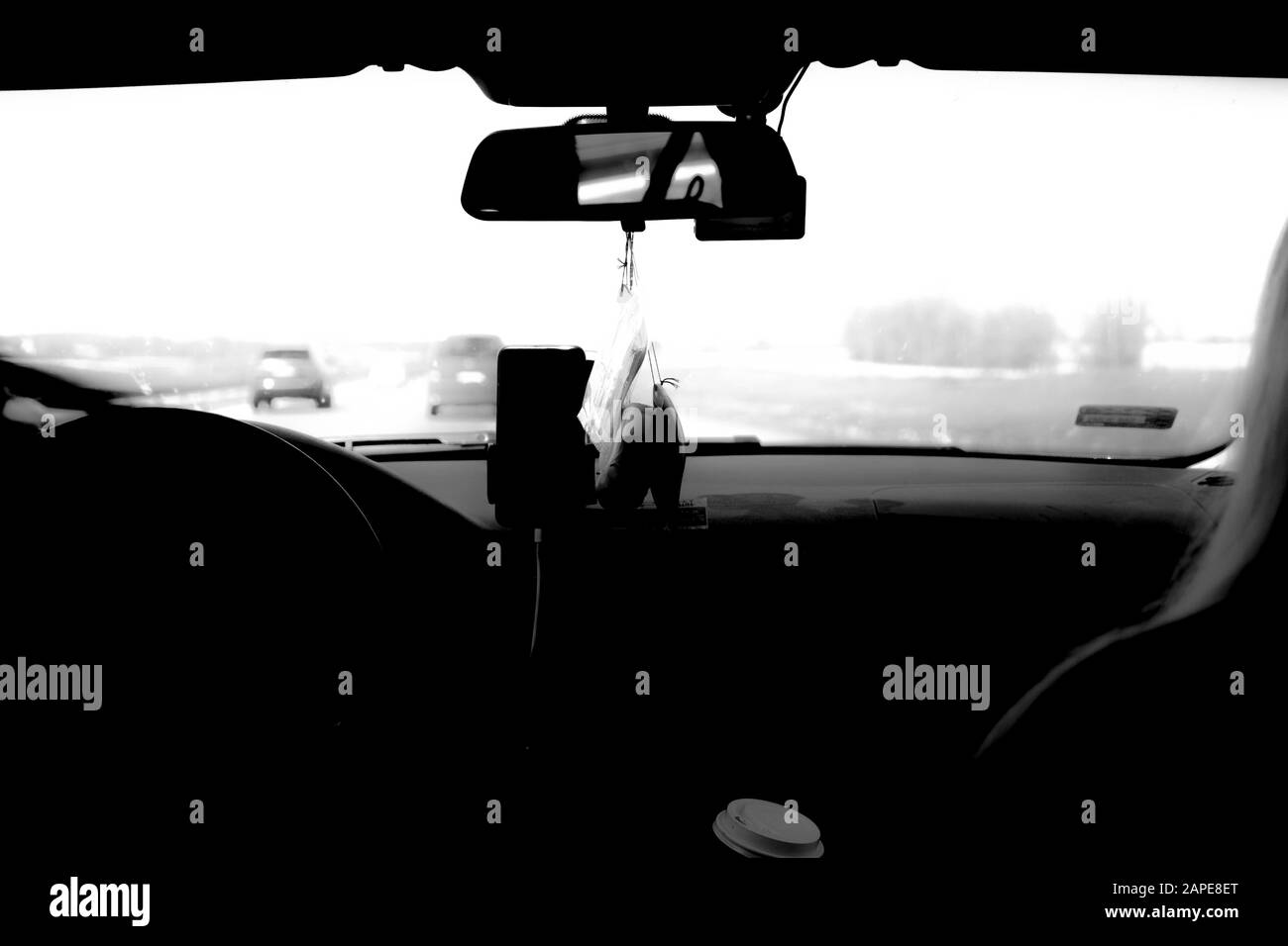 Photo of a windshield and dashboard from inside a car Stock Photo - Alamy