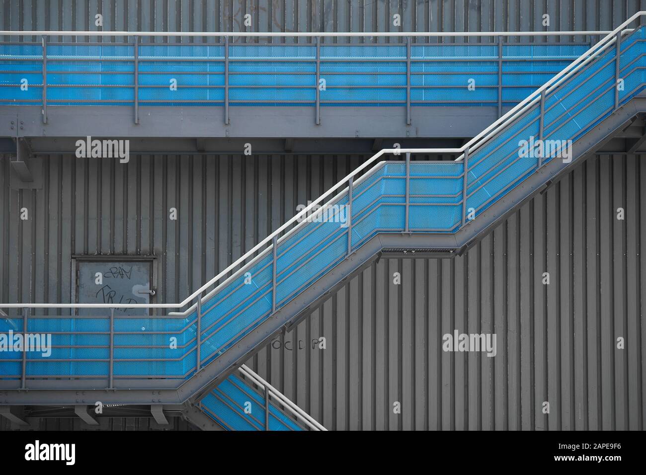 Metal building with stairs on the side Stock Photo - Alamy