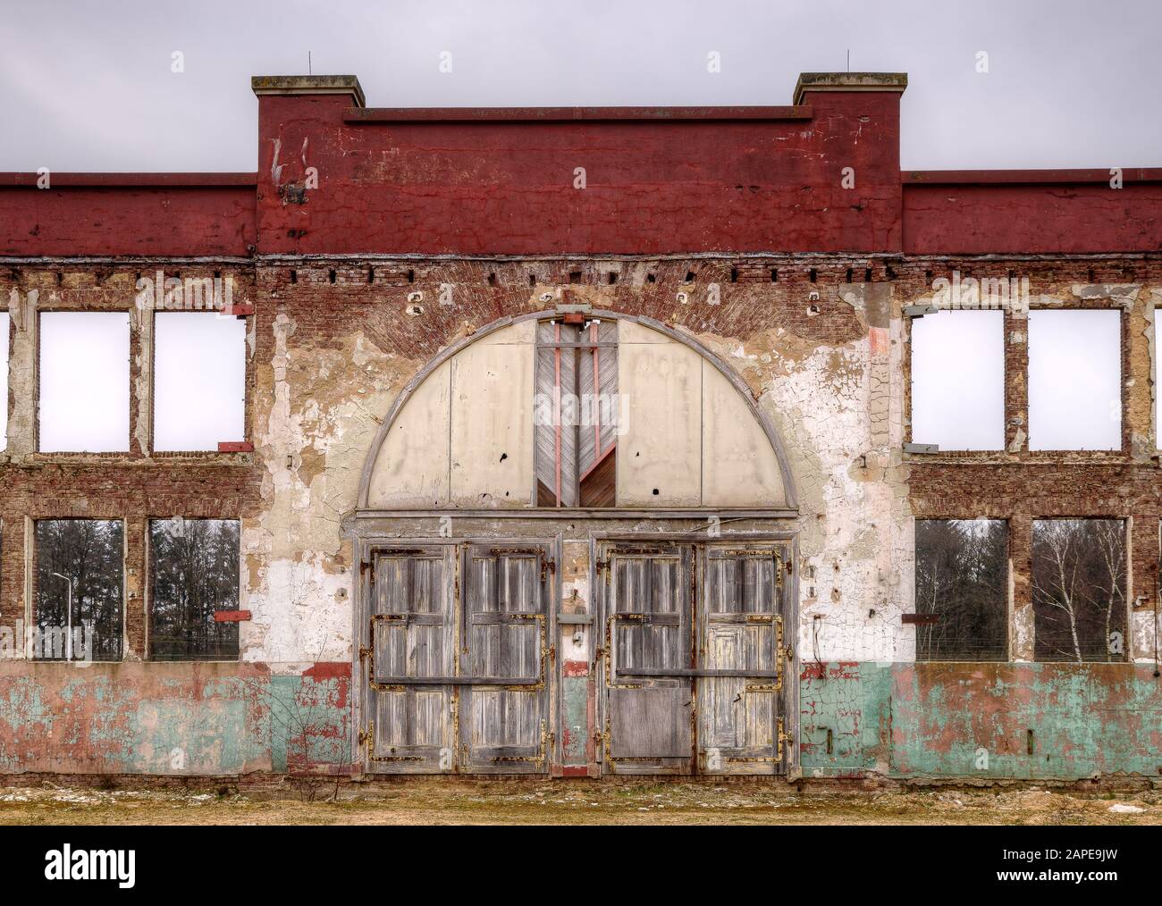 Old abandon building with wooden doors Stock Photo - Alamy