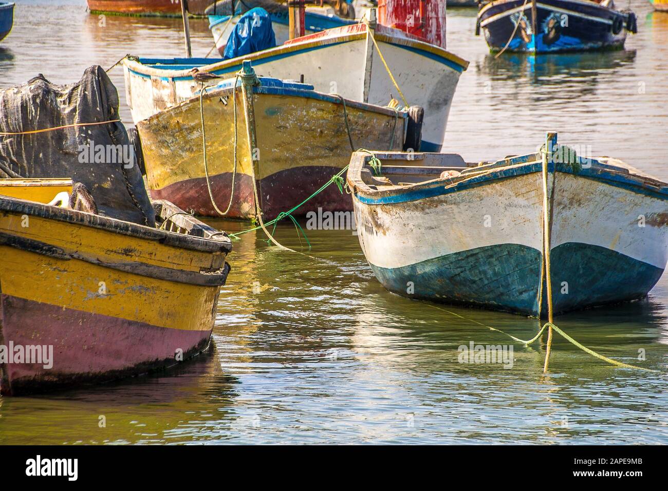 Wooden boats tied together hi-res stock photography and images - Alamy
