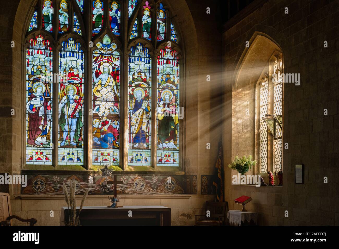St Michael and All Angels Church altar and stained glass window ...