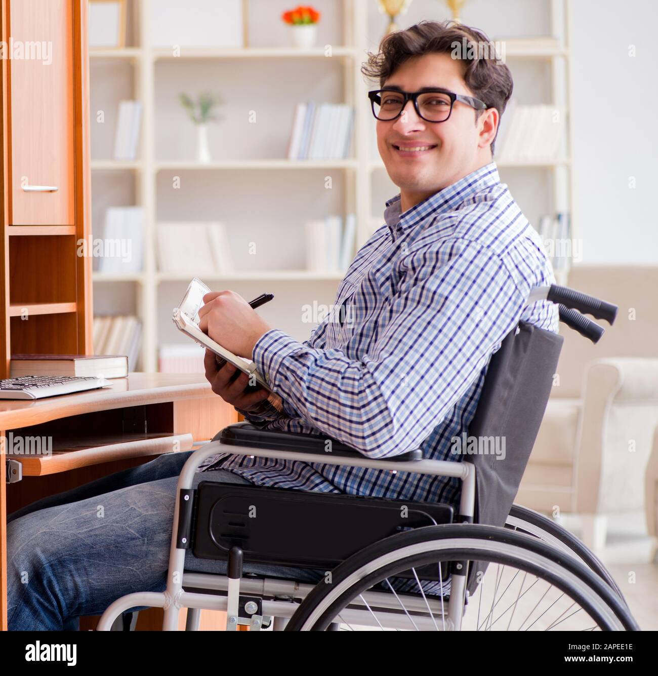 Taking care disabled student hi-res stock photography and images - Alamy