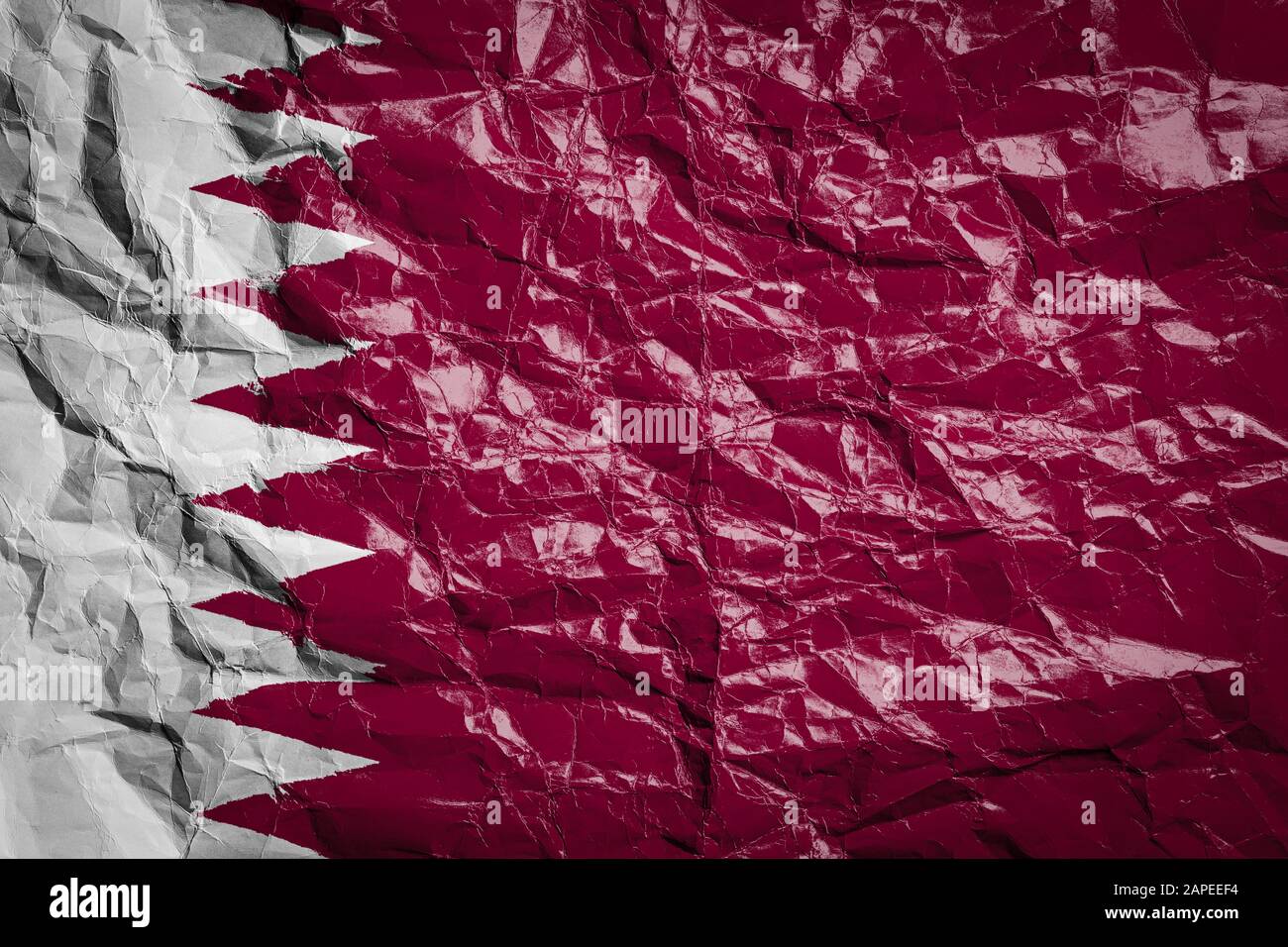 National flag of Qatar on crumpled paper. Flag printed on a sheet. Flag ...