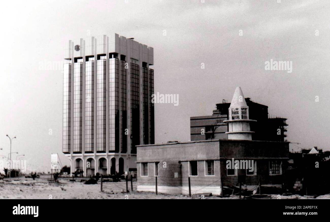 Abu Dhabi, first mosque and first high rise building, 1975 Stock Photo ...