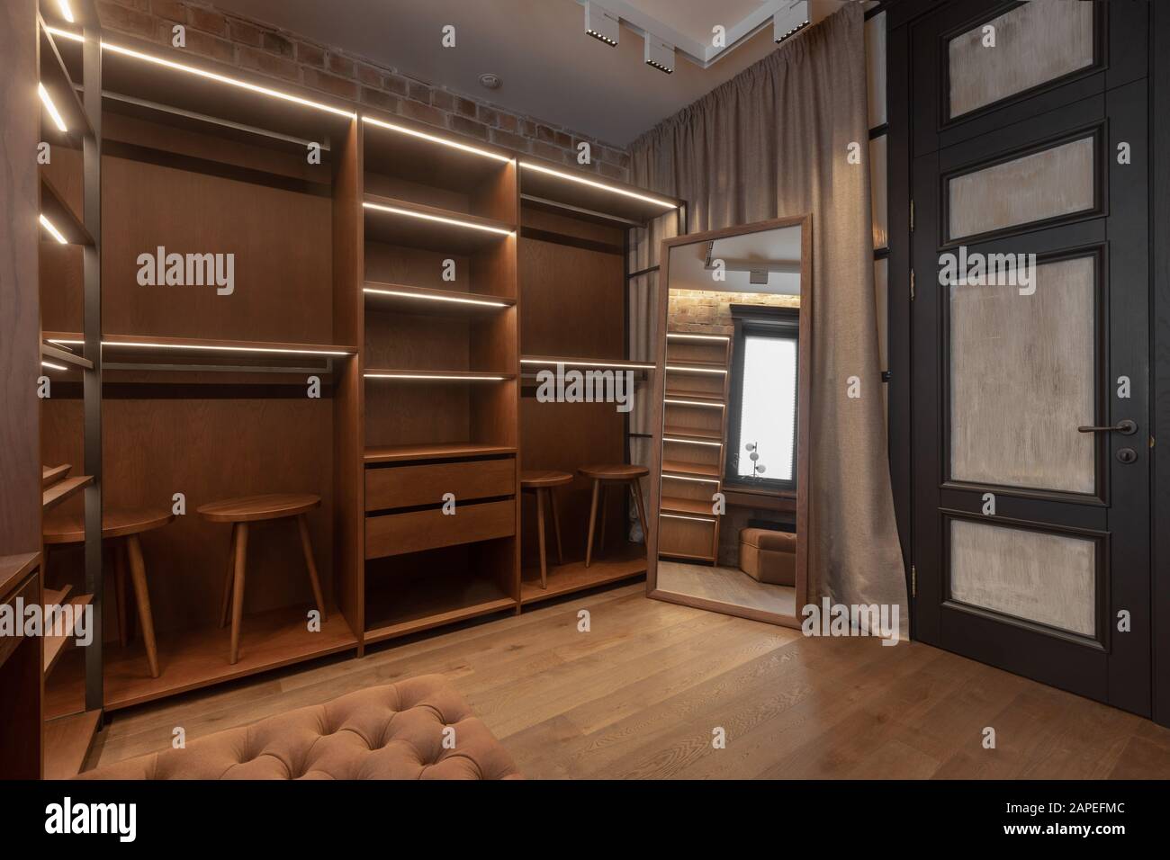 Dressing area with wardrobe and mirror Stock Photo - Alamy