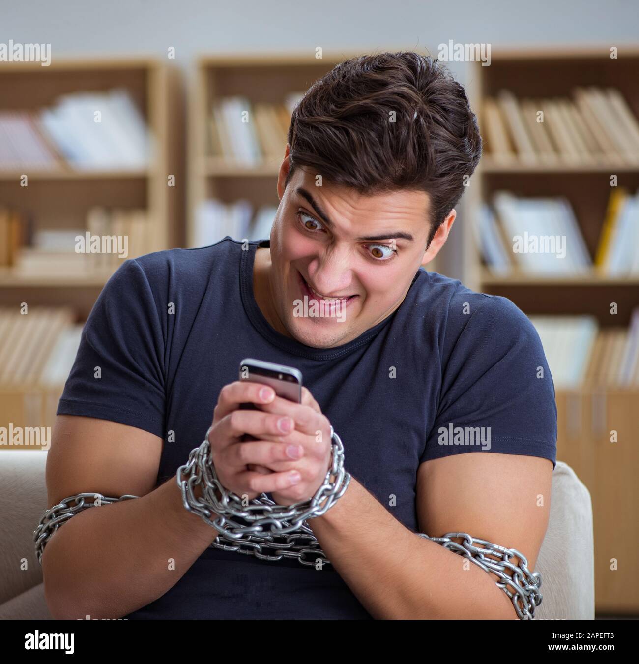 The man suffering from phone dependence addiction Stock Photo - Alamy