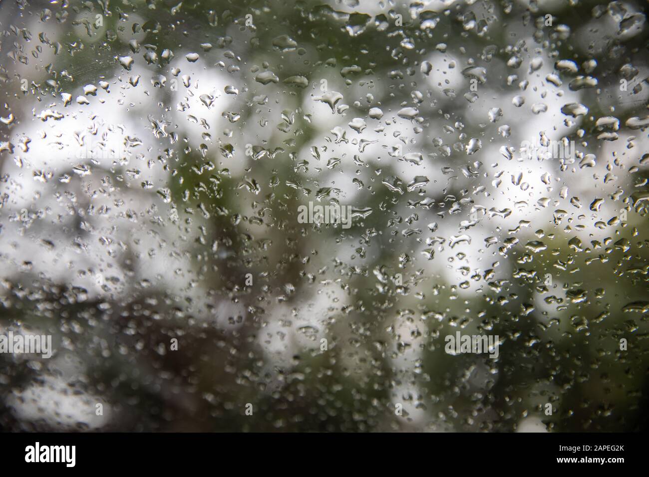 Water dripping on a glass. Use as background image for presentation ...