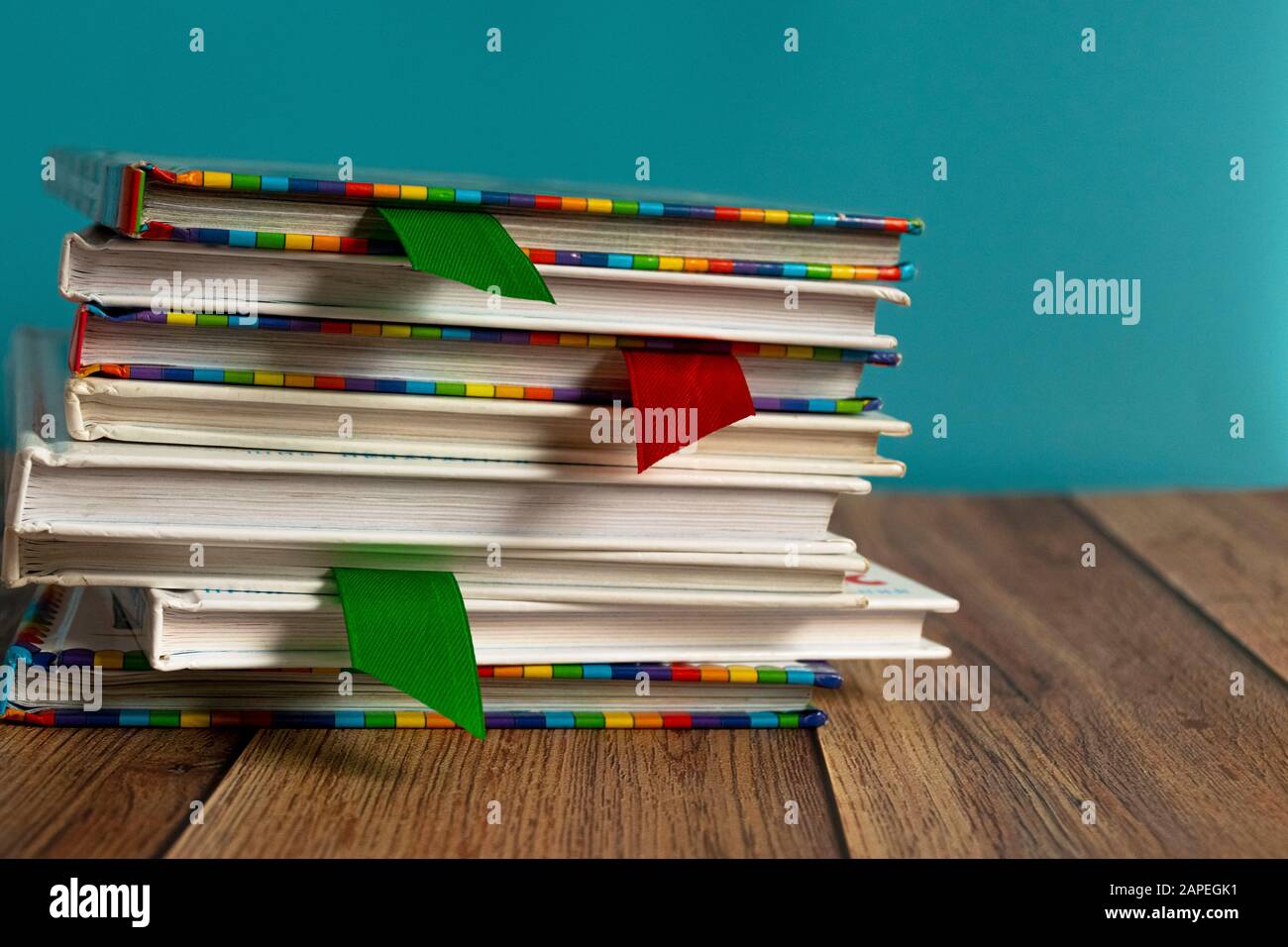 A stack of different bookmarks with bookmarks for pages. Book binding ...