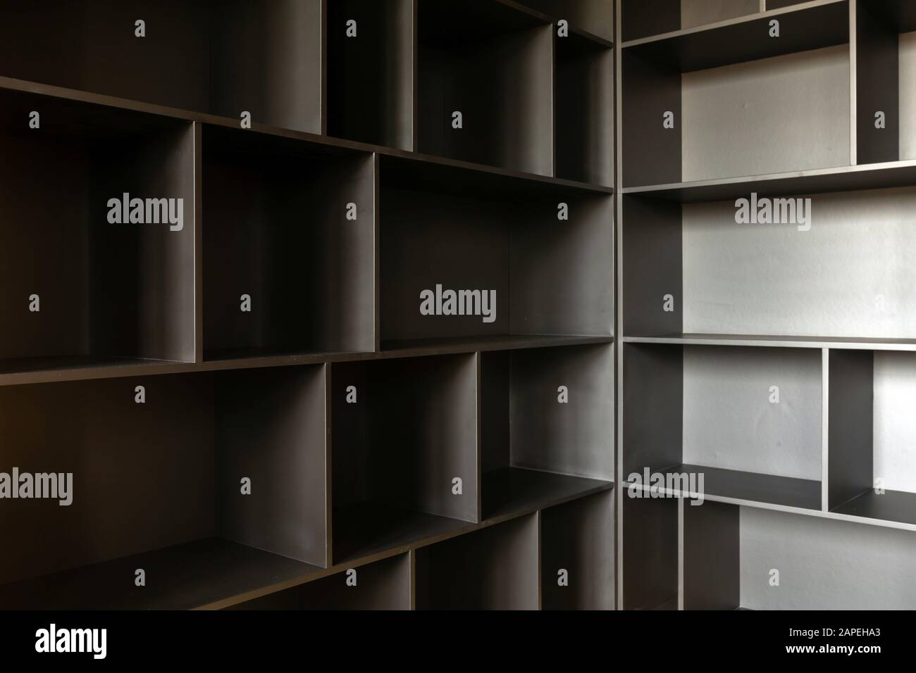 Row of shelves in corner Stock Photo - Alamy