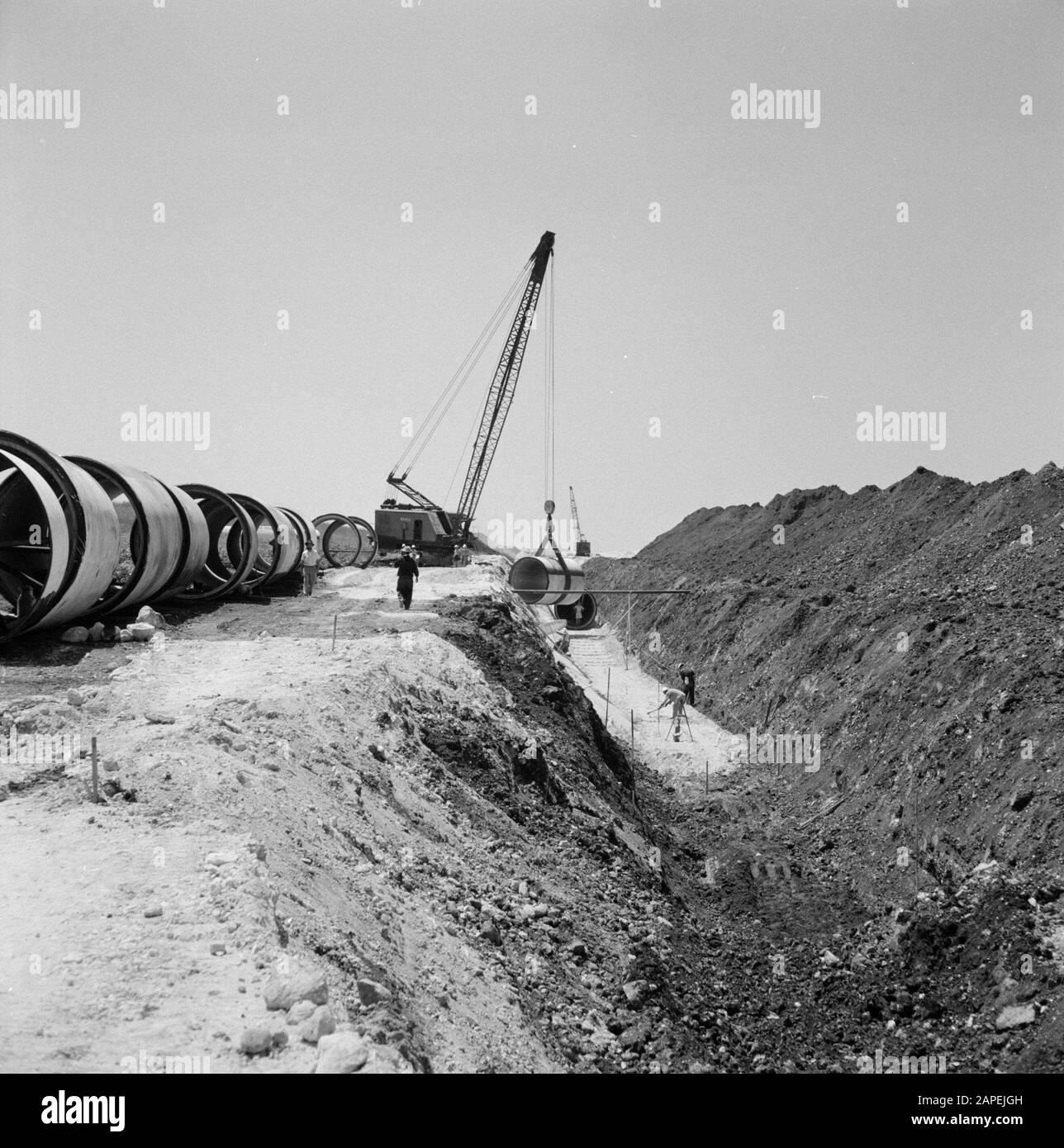 irrigation project in the Negev Desert. Pipes and a dragline at a ...