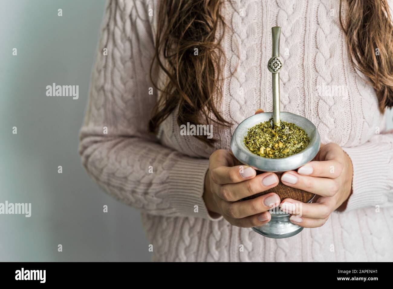 Young woman drinking traditional Argentinian yerba mate tea Stock Photo ...