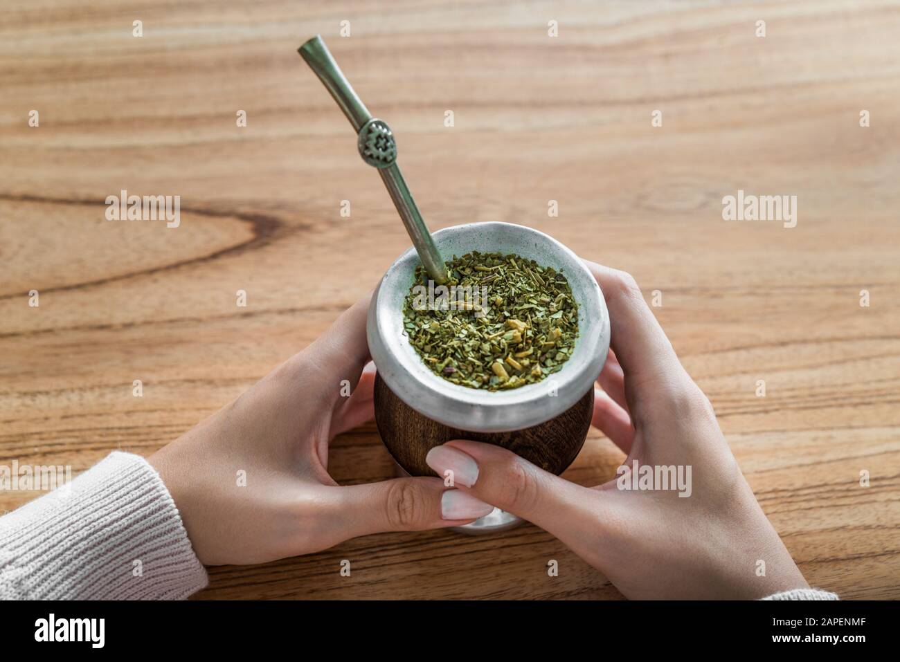 Young woman drinking traditional Argentinian yerba mate tea Stock Photo ...