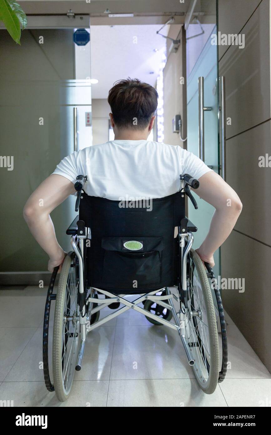 Disabled handicapped man sitting on wheelchair 138 Stock Photo - Alamy