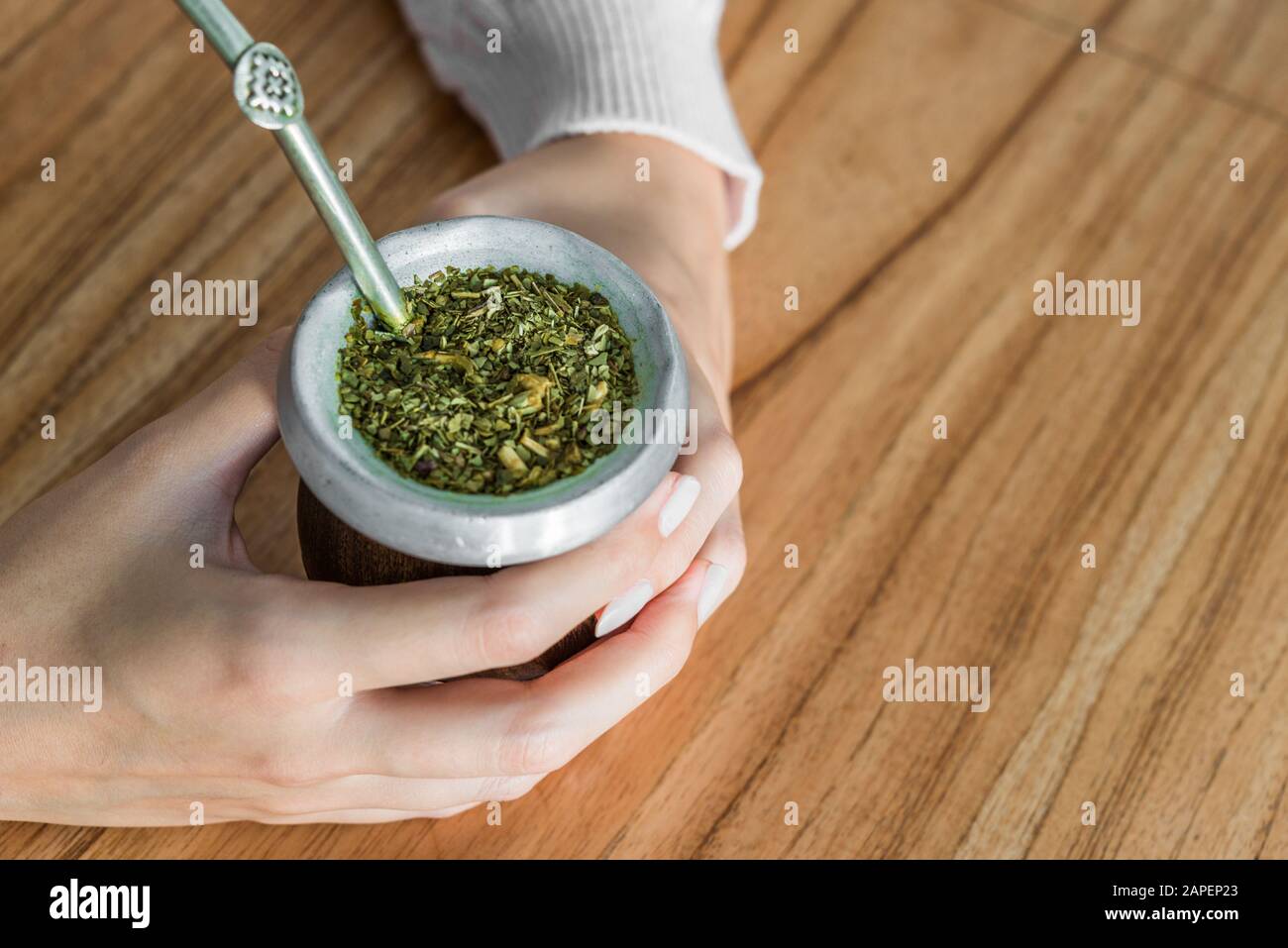 Young woman drinking traditional Argentinian yerba mate tea Stock Photo ...