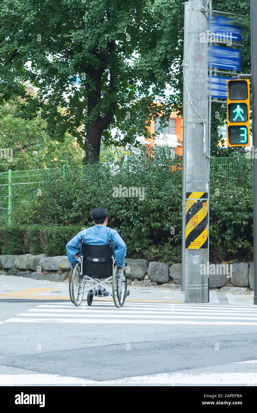 Disabled handicapped man sitting on wheelchair 090 Stock Photo - Alamy