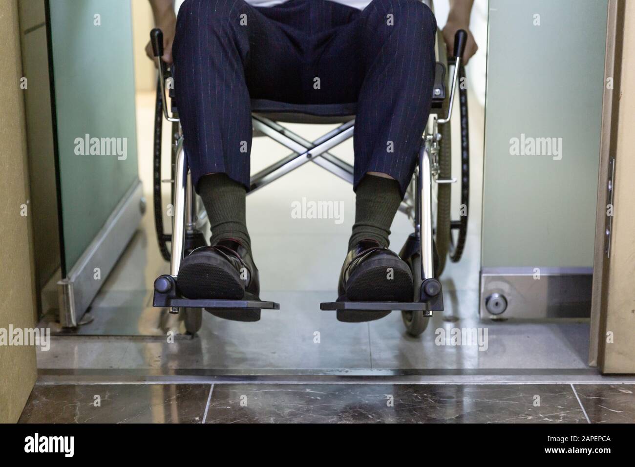 Disabled handicapped man sitting on wheelchair 086 Stock Photo - Alamy
