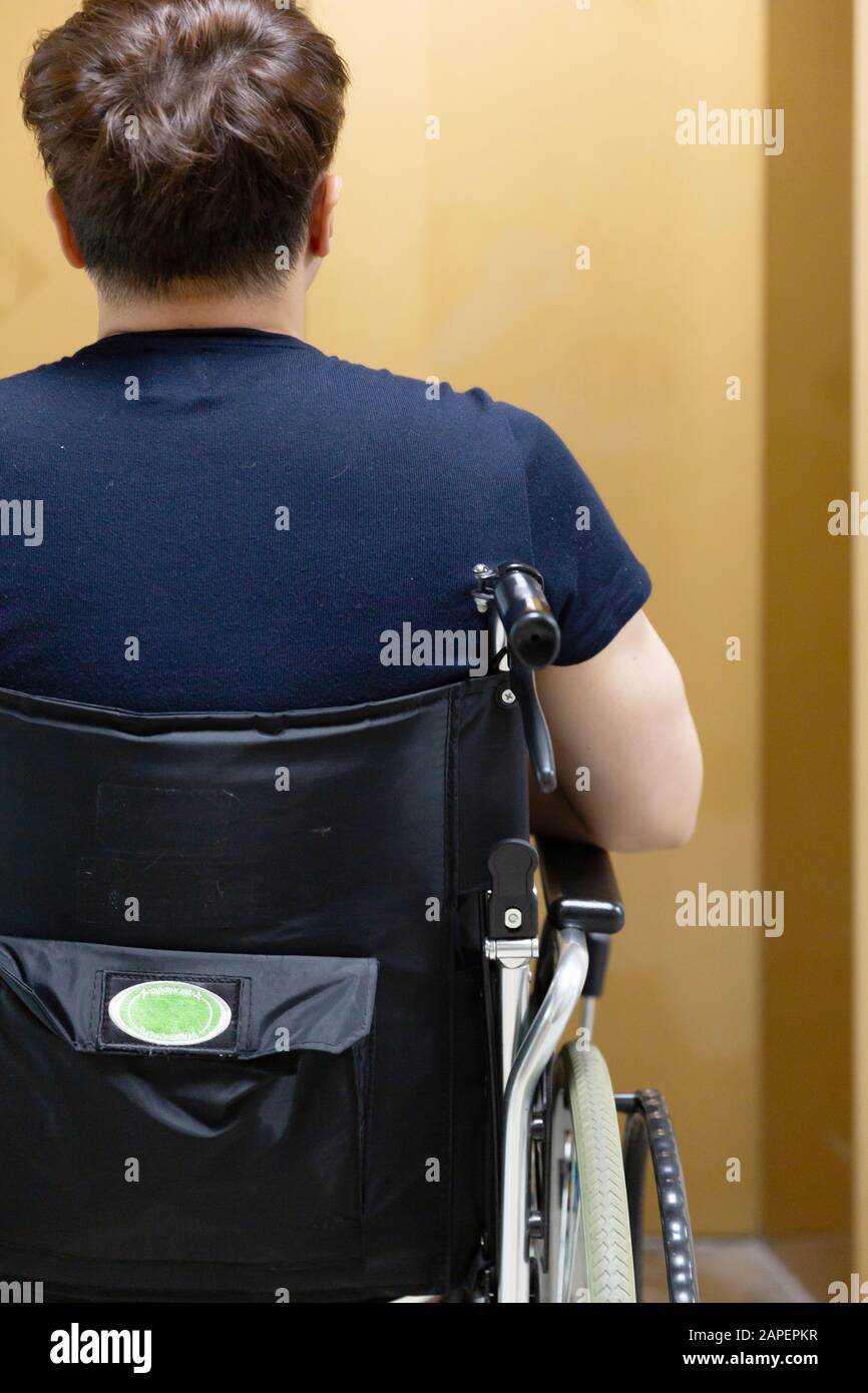 Disabled handicapped man sitting on wheelchair 063 Stock Photo - Alamy