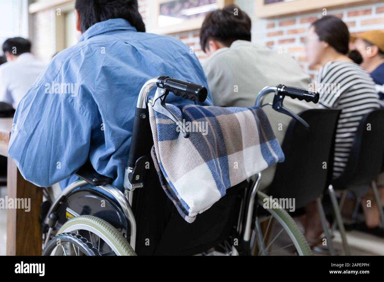 Disabled handicapped man sitting on wheelchair 062 Stock Photo - Alamy