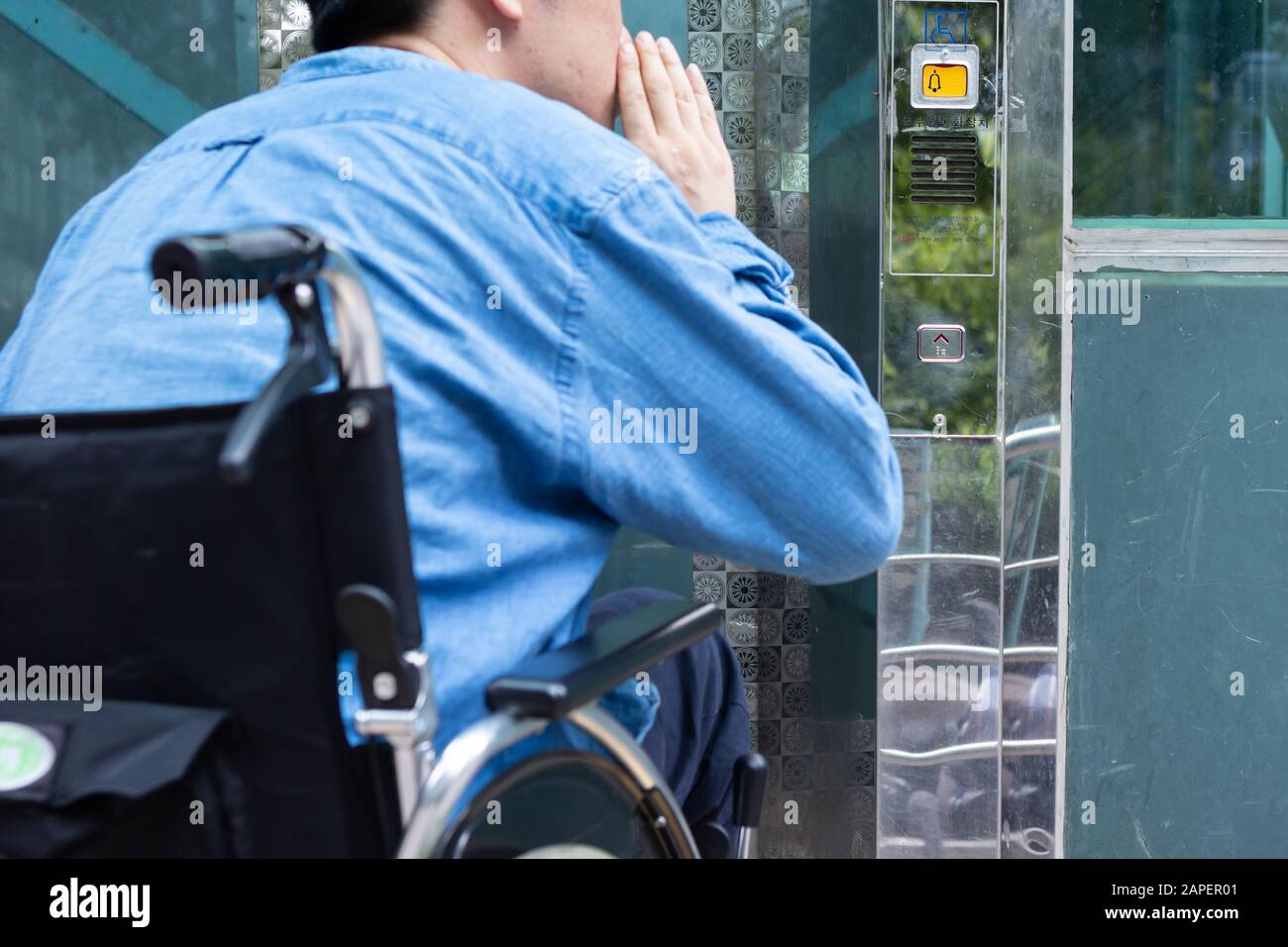 Disabled handicapped man sitting on wheelchair 034 Stock Photo - Alamy