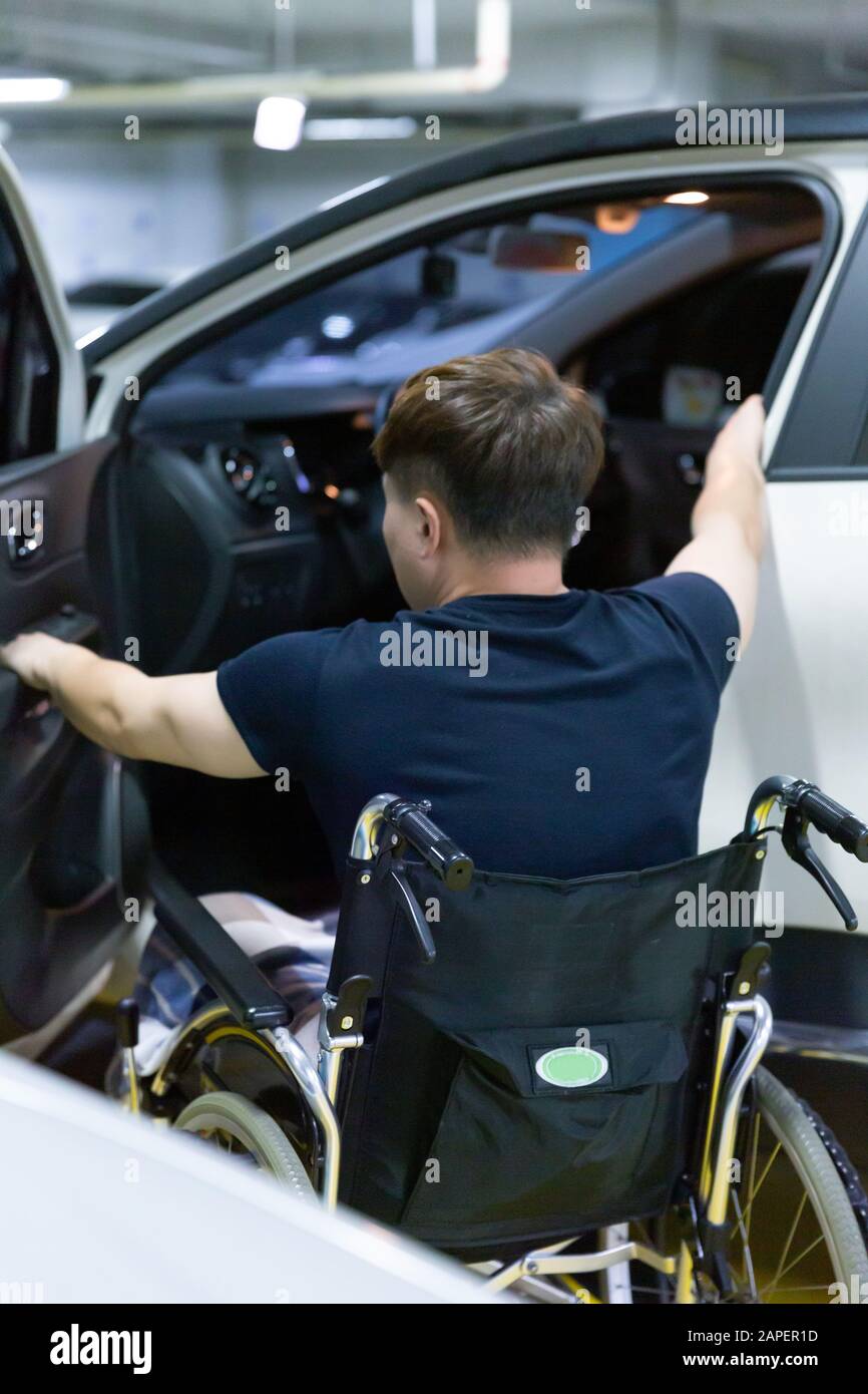 Disabled handicapped man sitting on wheelchair 041 Stock Photo - Alamy
