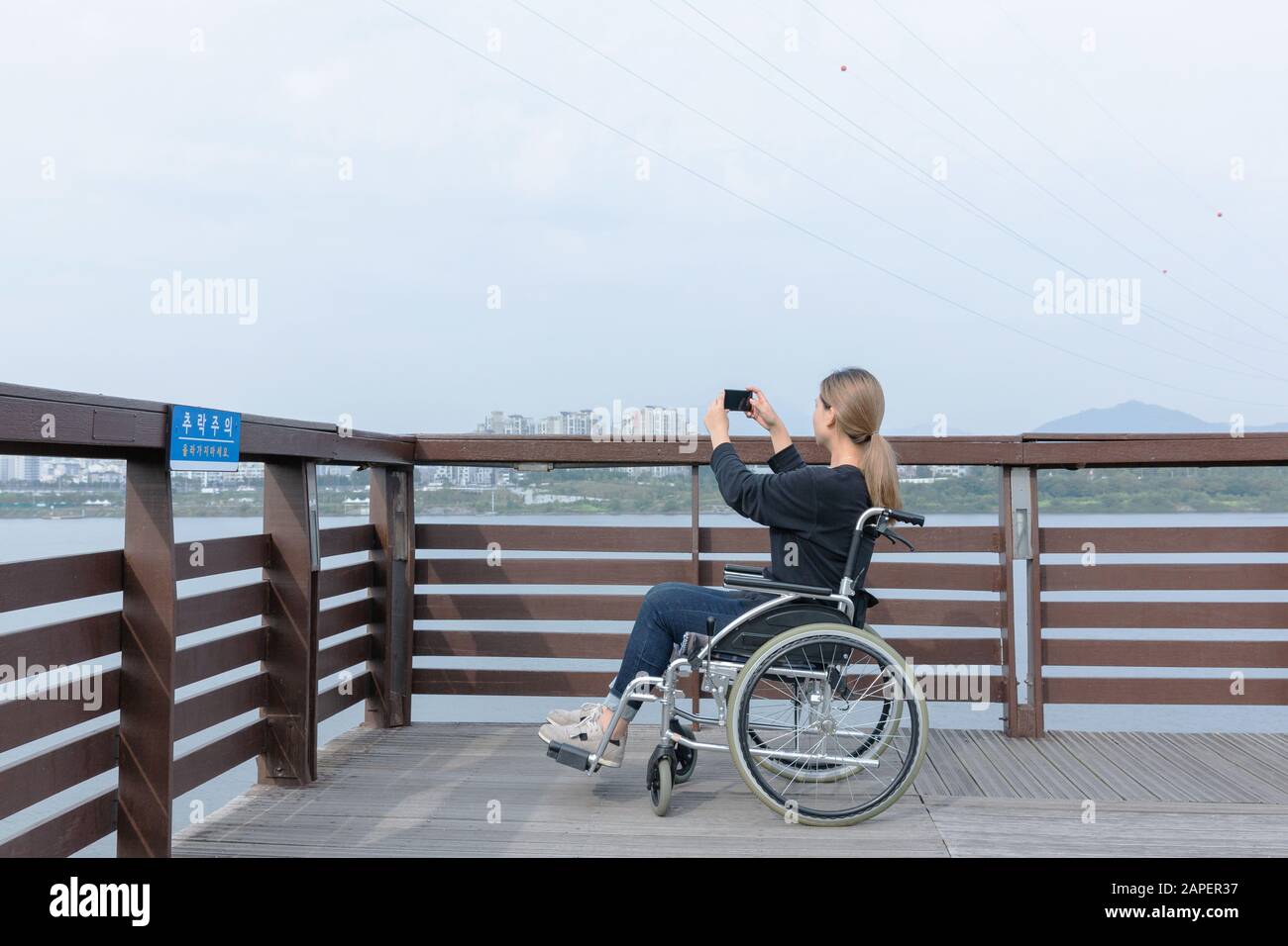 Disabled handicapped man sitting on wheelchair 030 Stock Photo - Alamy