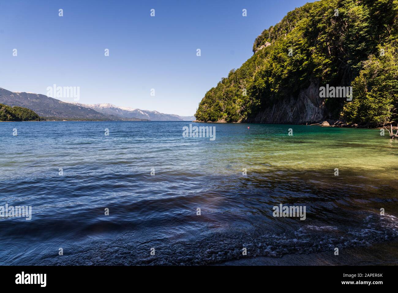 Landscape of blue lakes, Andes mountains, and forest in Patagonia ...