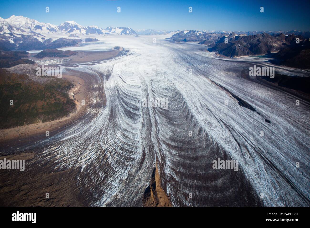 Massive bands of ice and rock flow from the Brady Ice field in Glacier ...