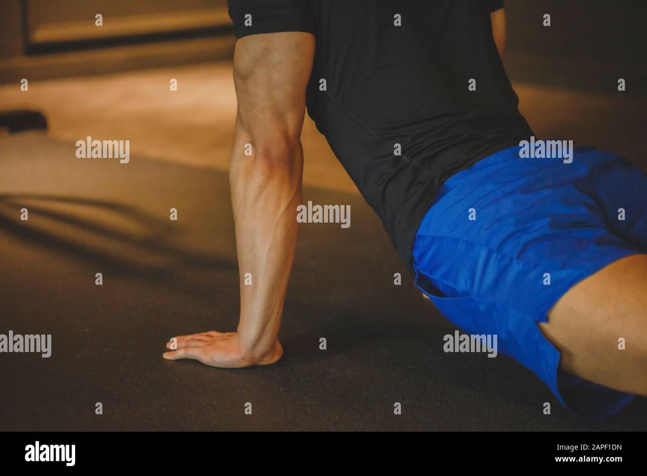 Male and female exercising in gym. Sport, fitness, weightlifting and ...