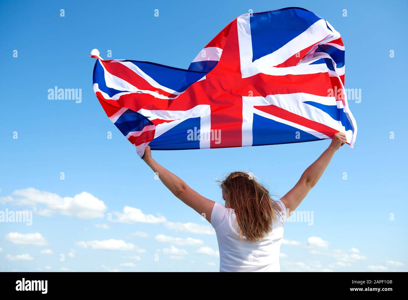 Hand waving british flag hi-res stock photography and images - Alamy