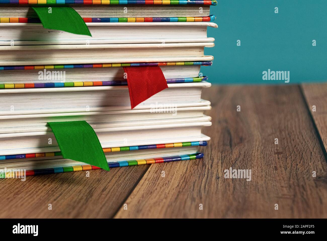 A stack of different bookmarks with bookmarks for pages. Book binding ...
