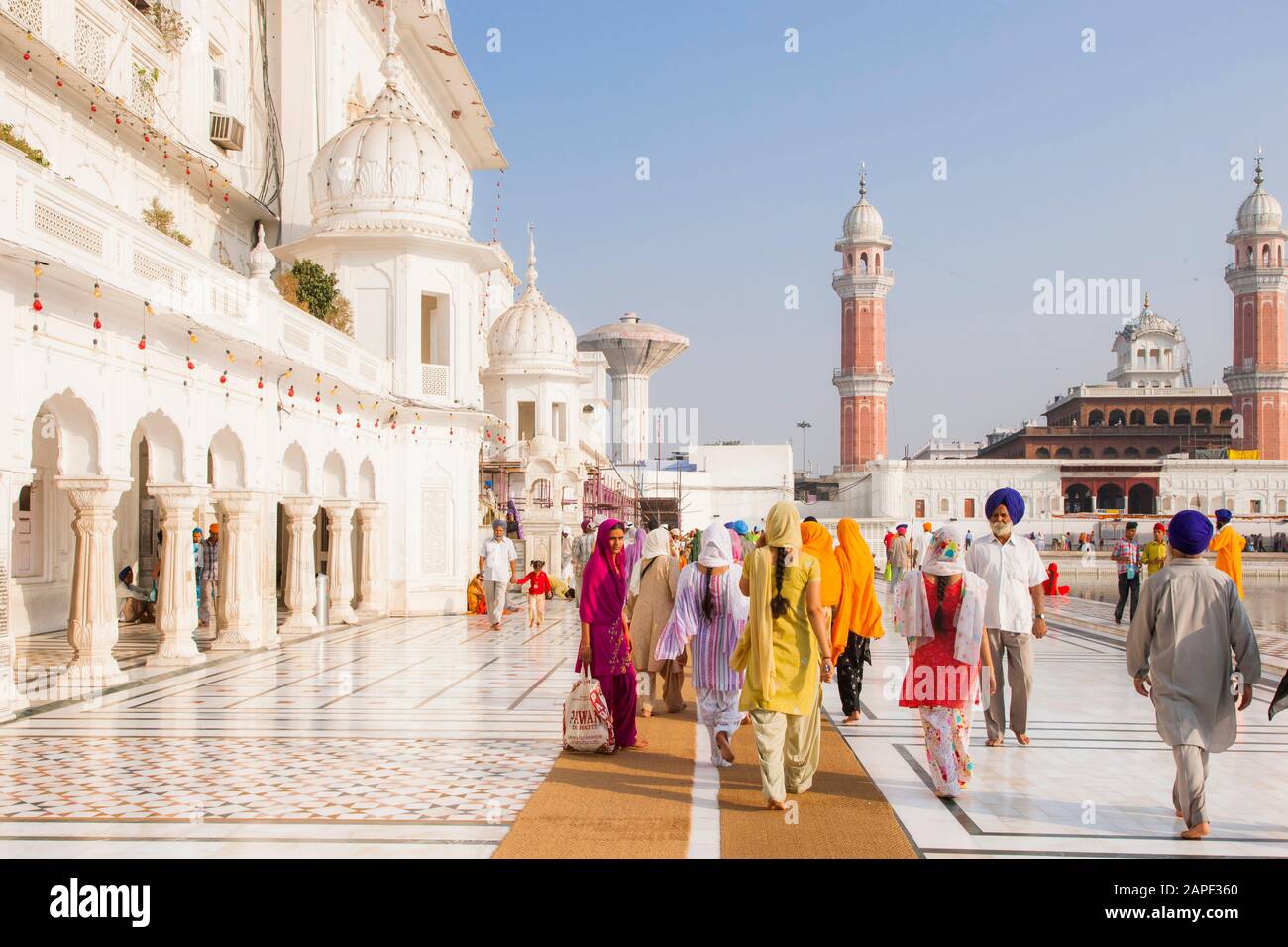 Pilgrims at Golden temple of Sikh, also Harmandir Sahib, holiest ...