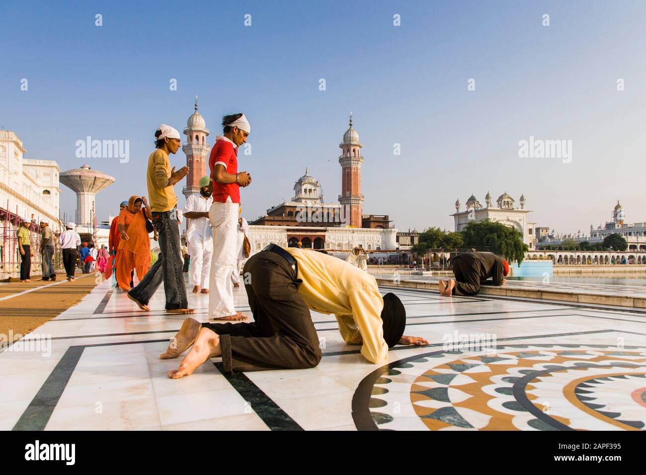 Prayer at Golden temple of Sikh, also Harmandir Sahib, holiest Gurdwara ...